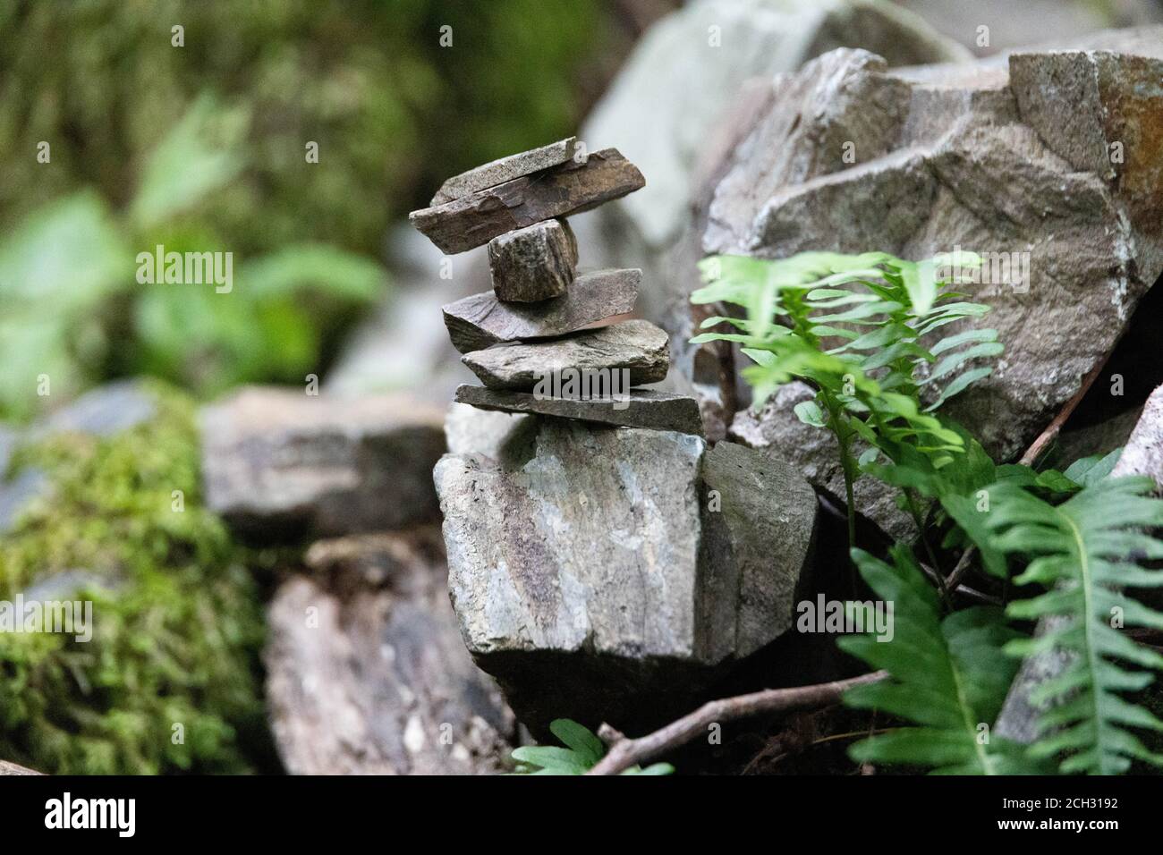 A stack of stones stands on top of each other. Mysterious ritual ...