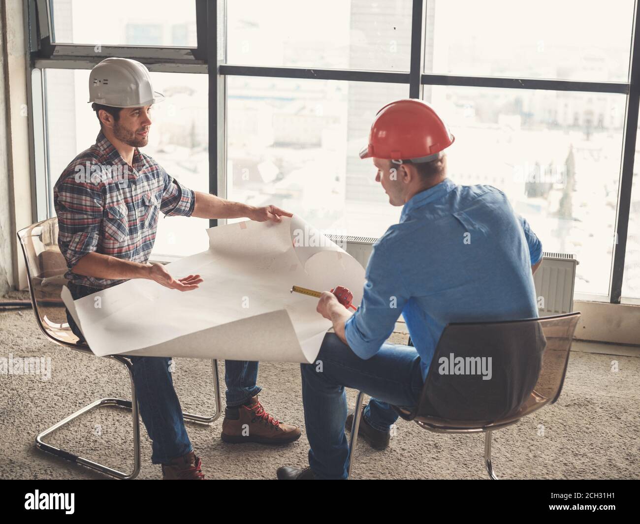 top view photo. surprised leader of the company is scolding the lazy ...