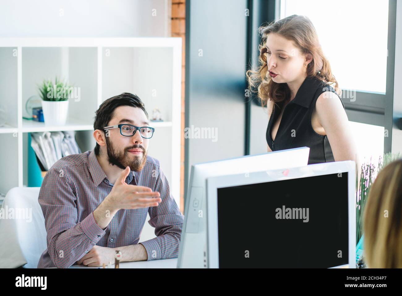 Programmer explaining hi-res stock photography and images - Alamy