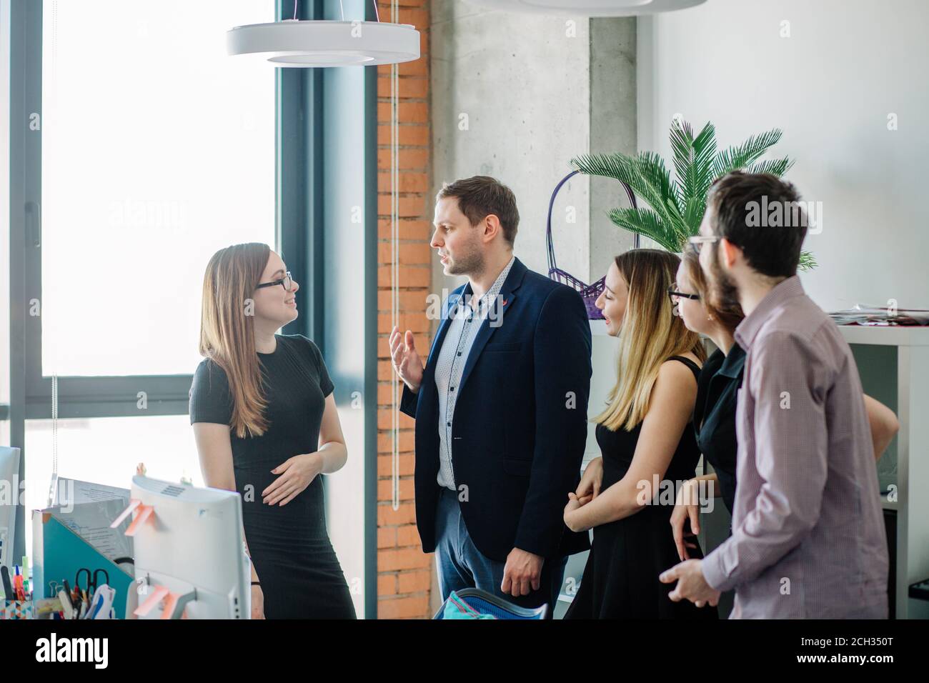 caucasian chief and his partners are talking with new beautiful ...