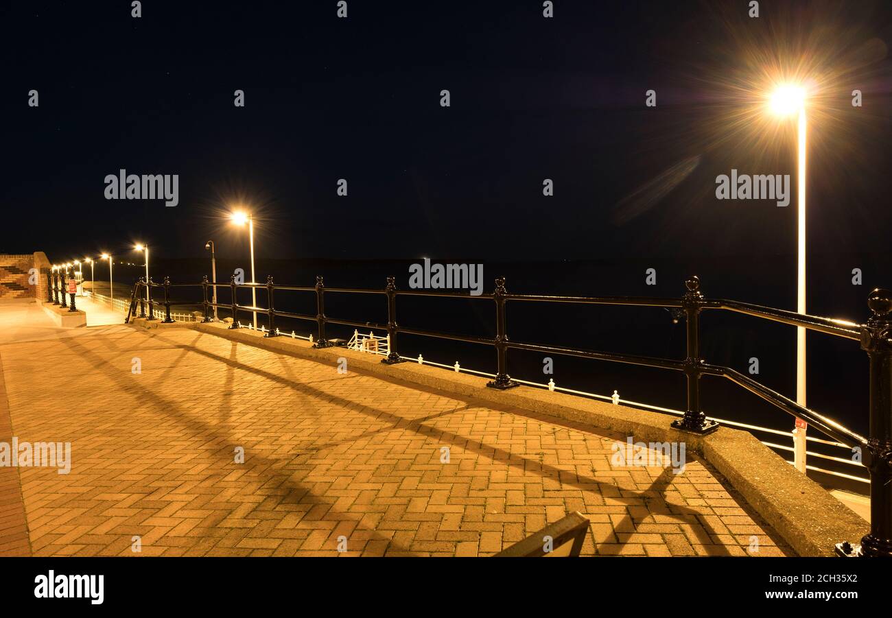 Sea front promenade at night Stock Photo - Alamy