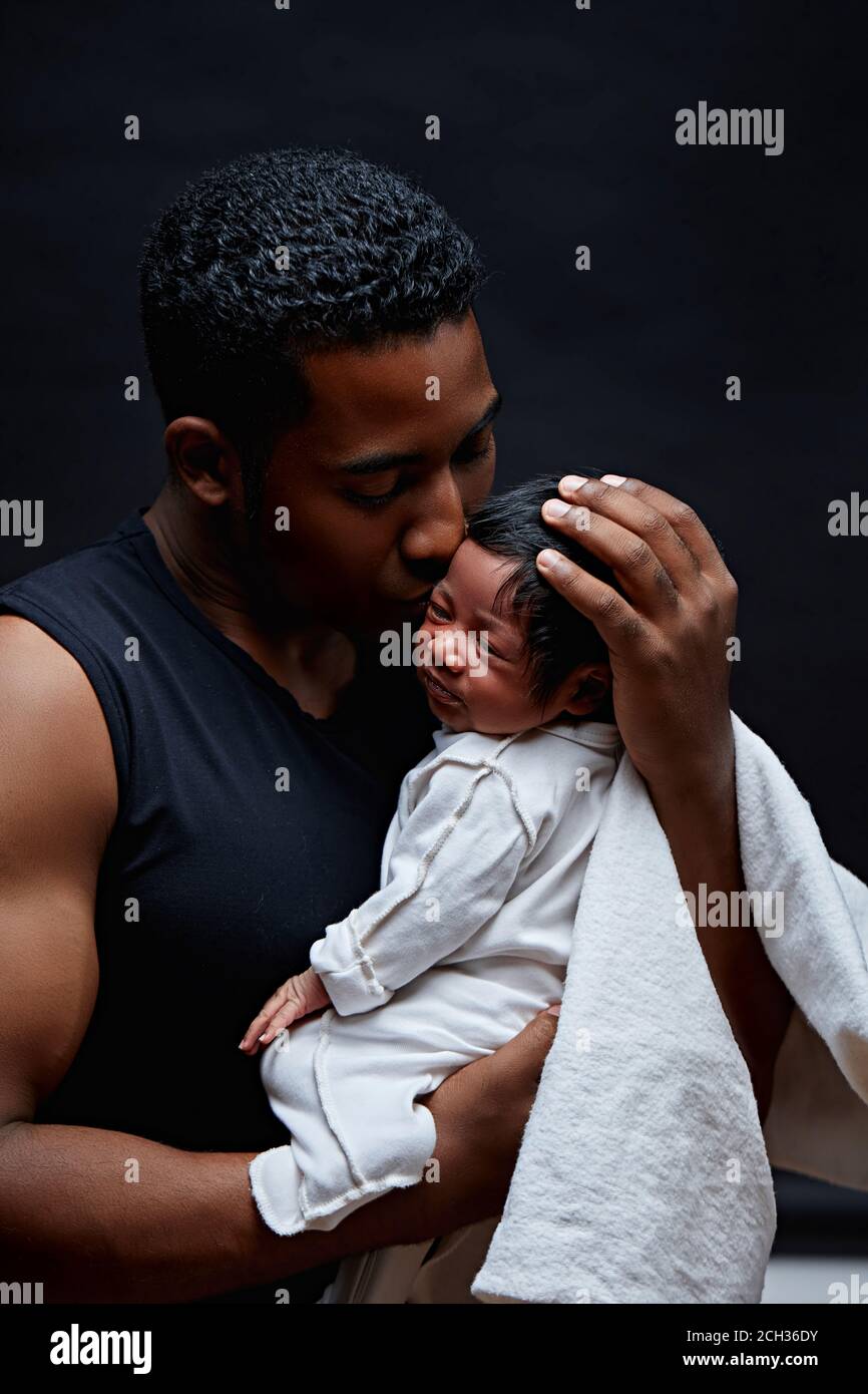 cunning baby with his daddy. affection for children.genuine love ...
