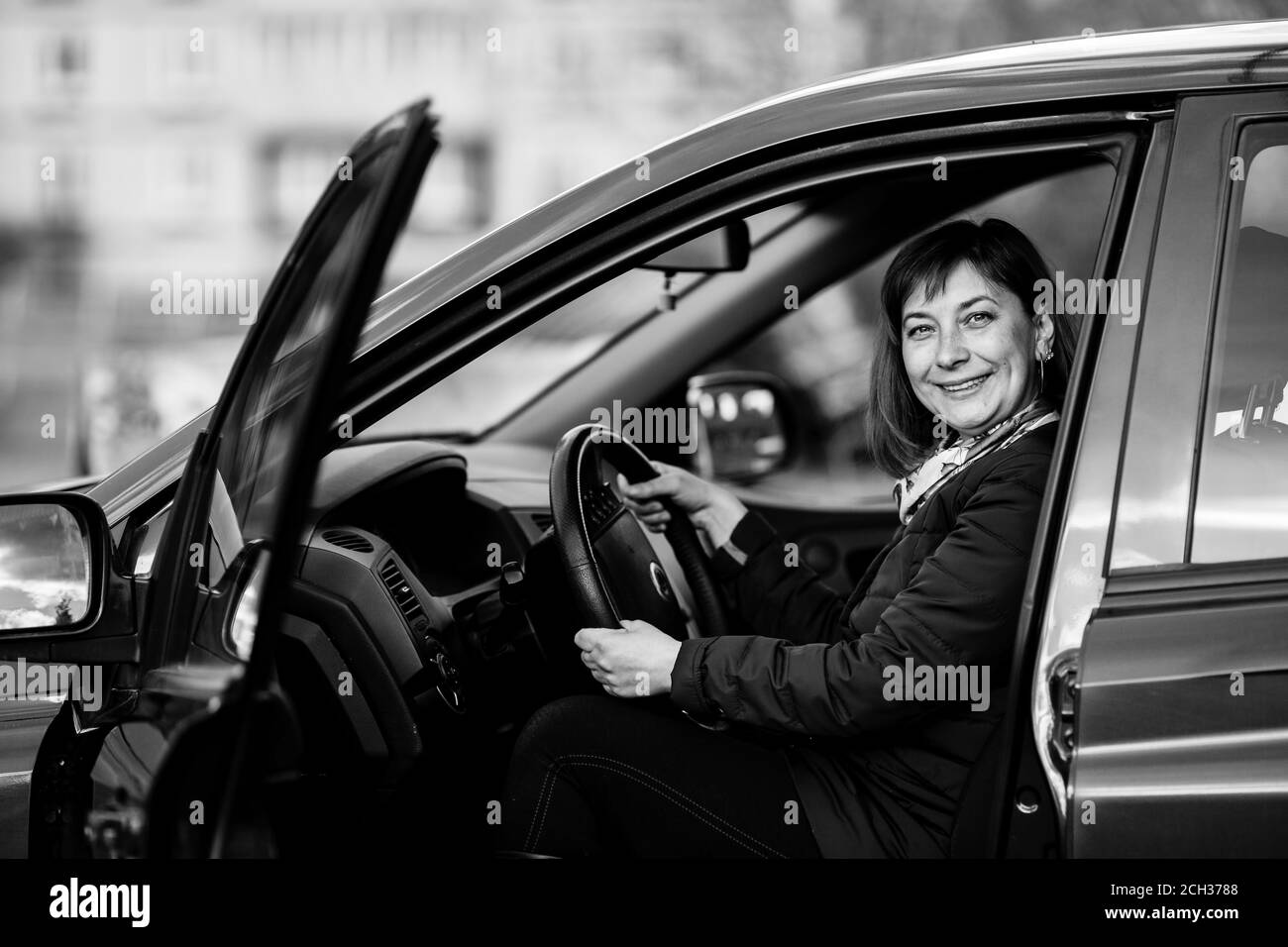 Black woman driving a car Black and White Stock Photos & Images - Alamy