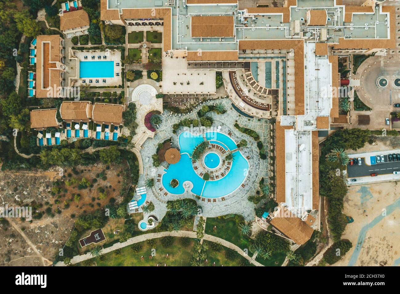 Top view of swimming pool in resort area with hotel or villa in ...