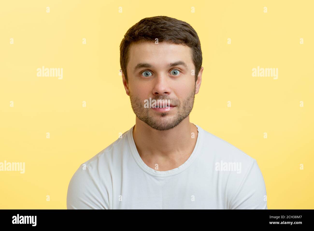 a pleasant guy with astonished expression as he has seen the accident ...