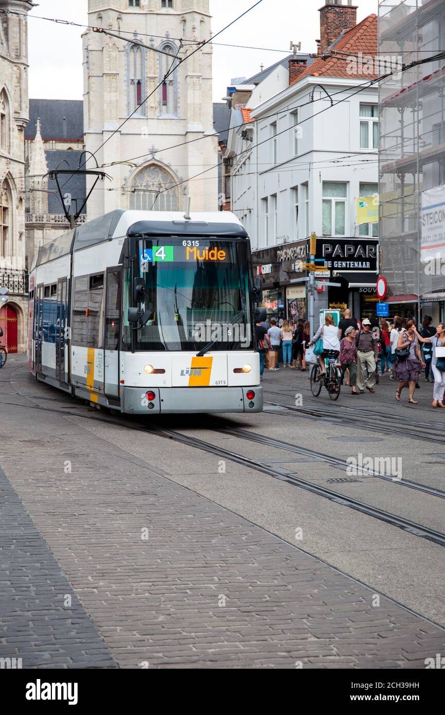 Tram on a street in Ghent Stock Photo - Alamy