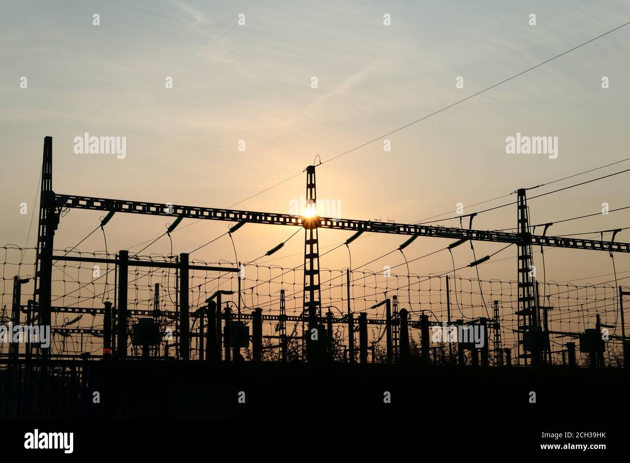 Group of electric pylons, high voltage lines. Overhead cables carrying ...
