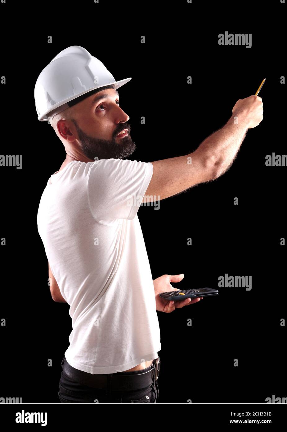 Construction worker young measure hi-res stock photography and images ...