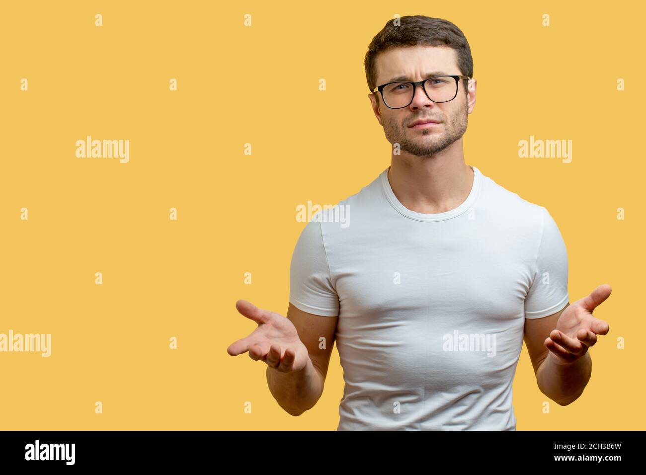 young man with incredulous look is talking about a problem using ...