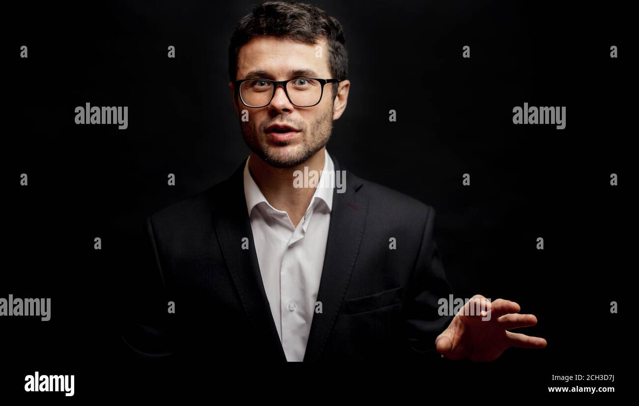 young handsome man hypnotizing people with his stare.close up portrait ...