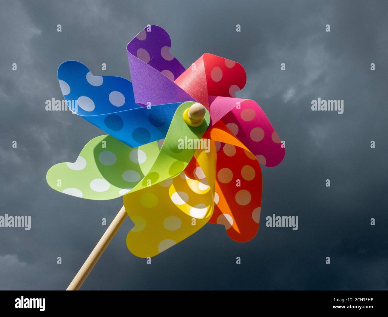 Childs hand held windmill hi-res stock photography and images - Alamy