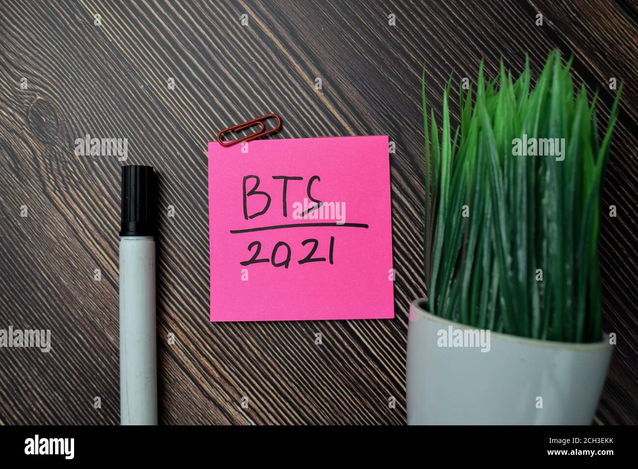 BTS 2021 write on sticky notes isolated on office desk Stock Photo - Alamy