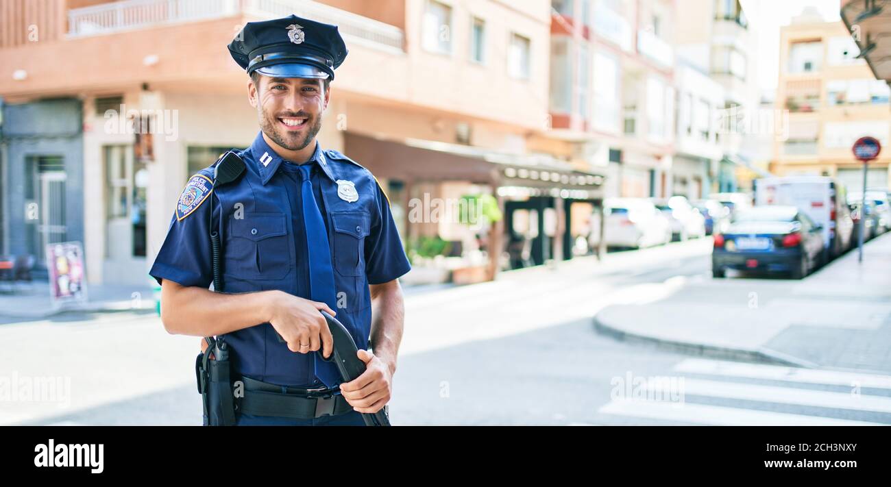 Walking holding standing officer smiling hi-res stock photography and ...