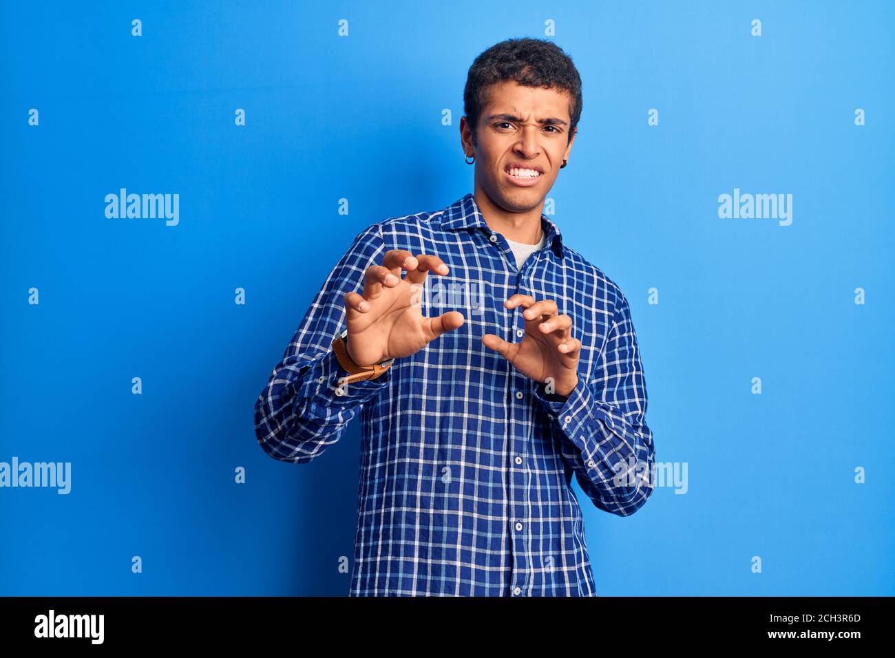Young african amercian man wearing casual clothes disgusted expression ...