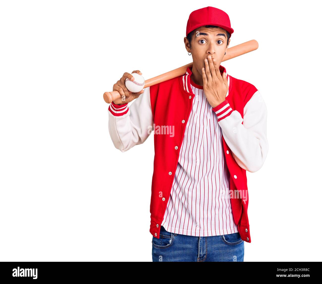 Young african amercian man playing baseball holding bat and ball ...