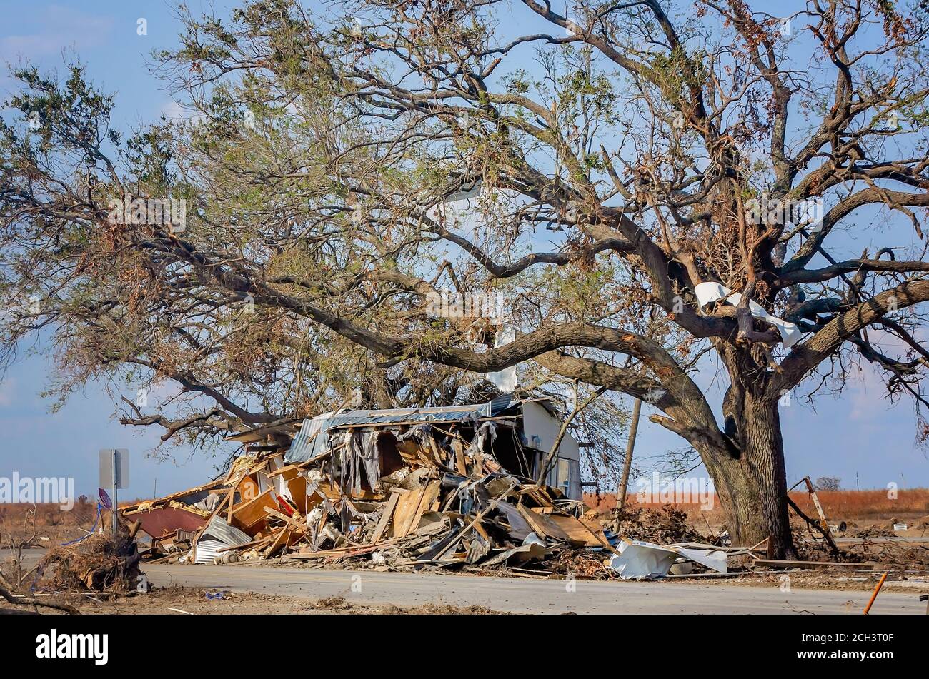 Debris surrounds a damaged home after Hurricane Laura, Sept. 11, 2020 ...