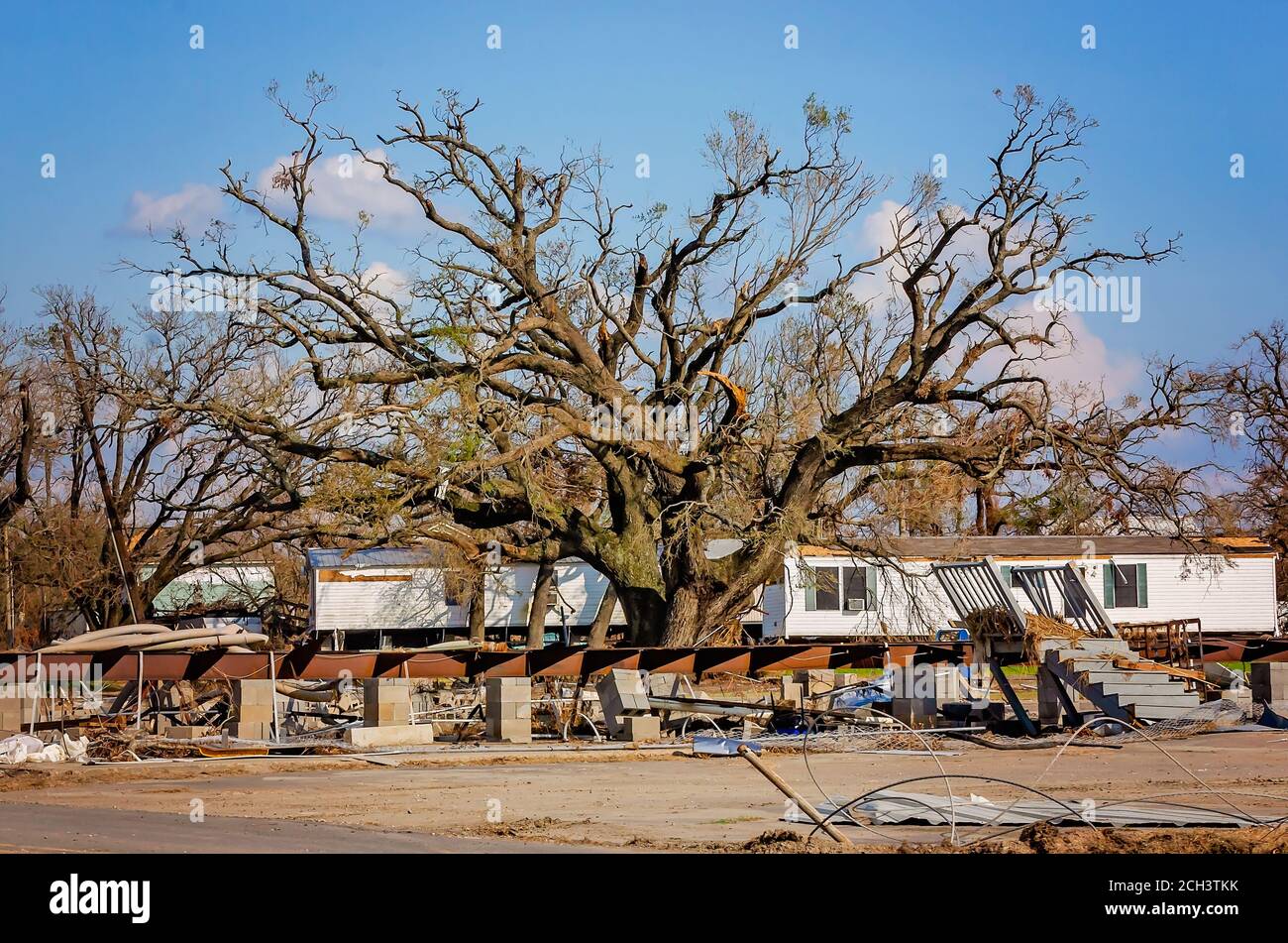 Debris surrounds a damaged home after Hurricane Laura, Sept. 11, 2020 ...