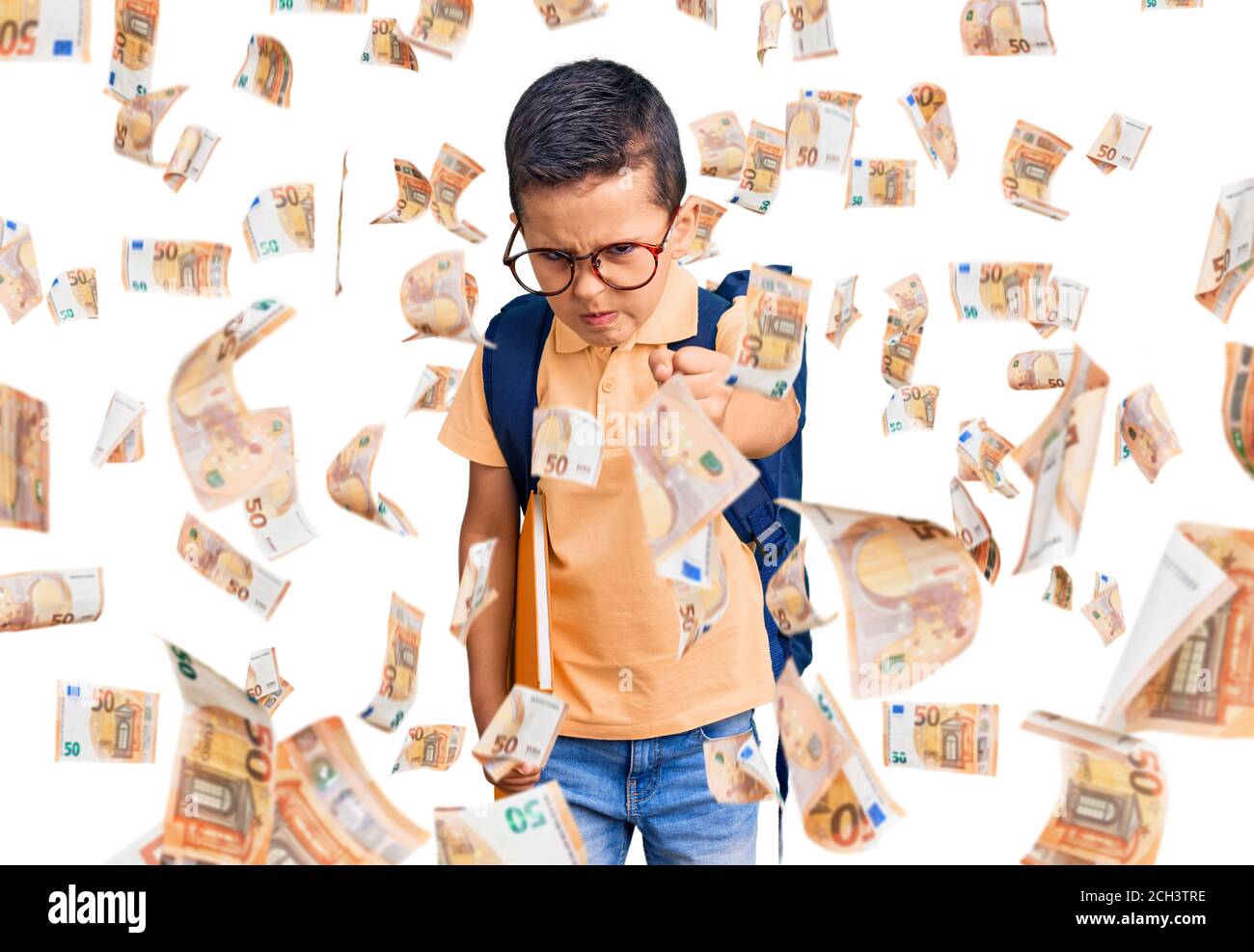 Little cute boy kid wearing school bag and holding book annoyed and ...