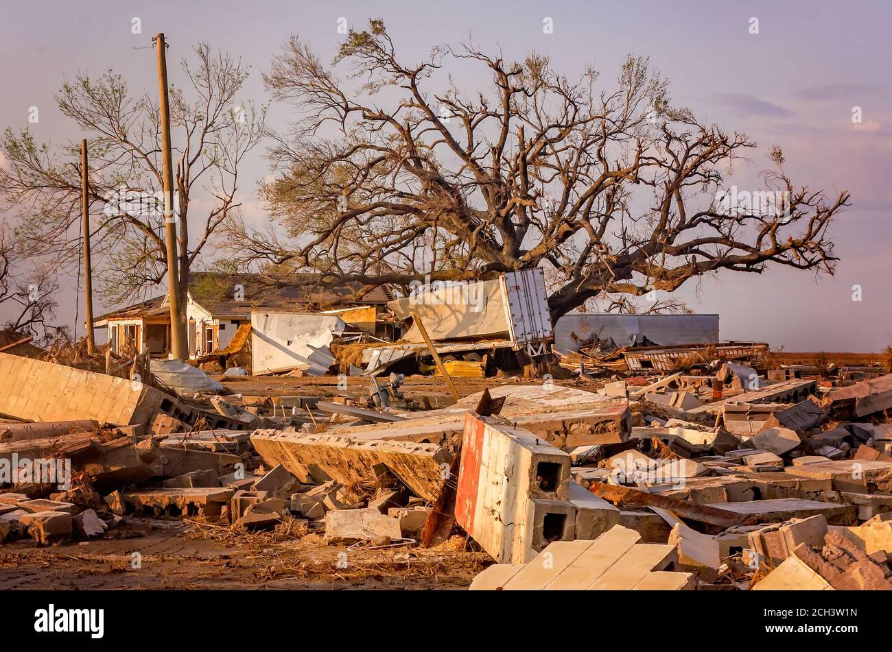 Debris surrounds a home damaged by Hurricane Laura, Sept. 11, 2020, in ...