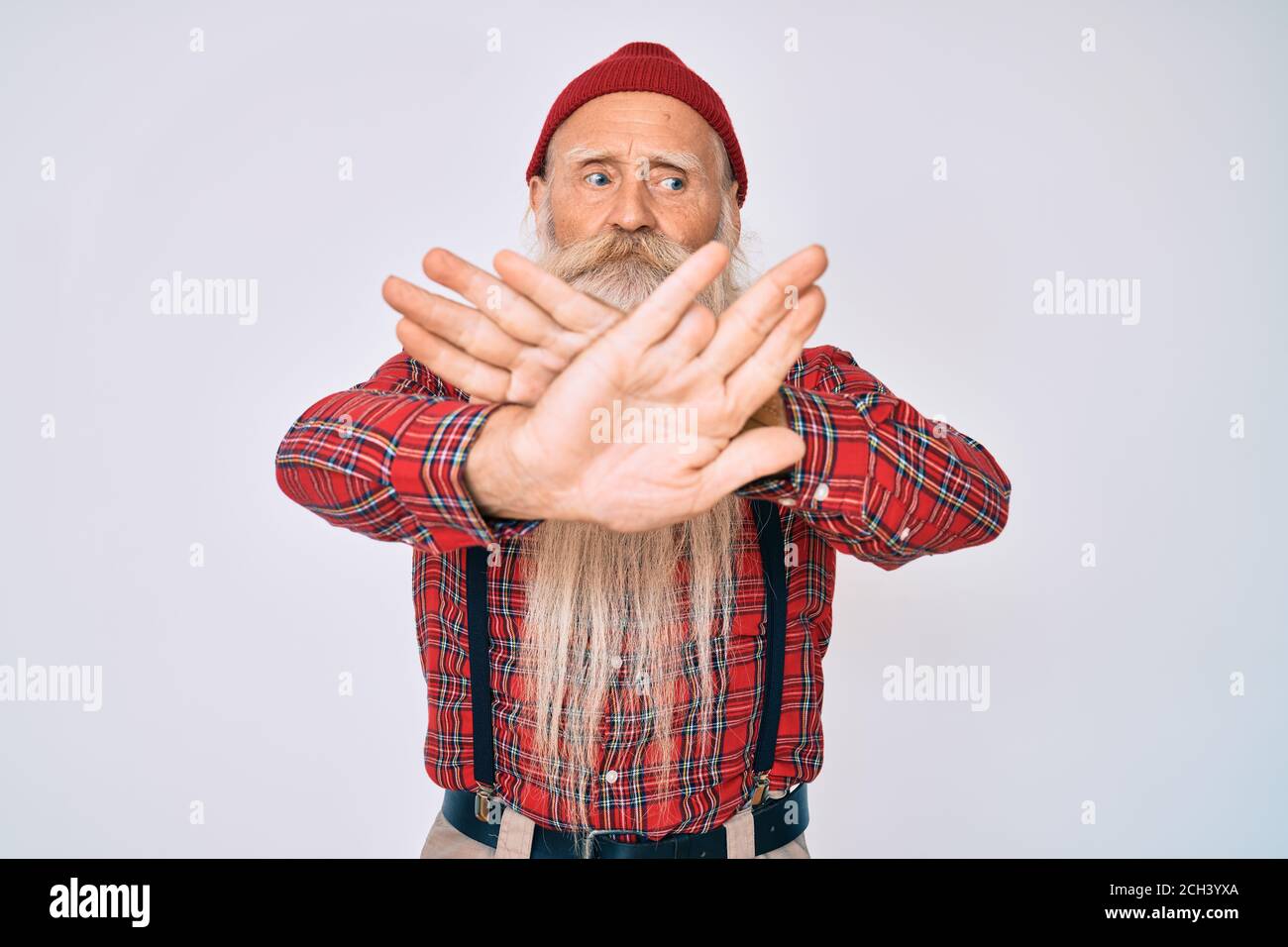Old senior man with grey hair and long beard wearing hipster look with ...