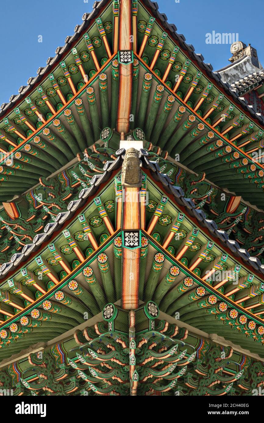 Detail of the vibrant colours of traditionally painted wooden beams and ...