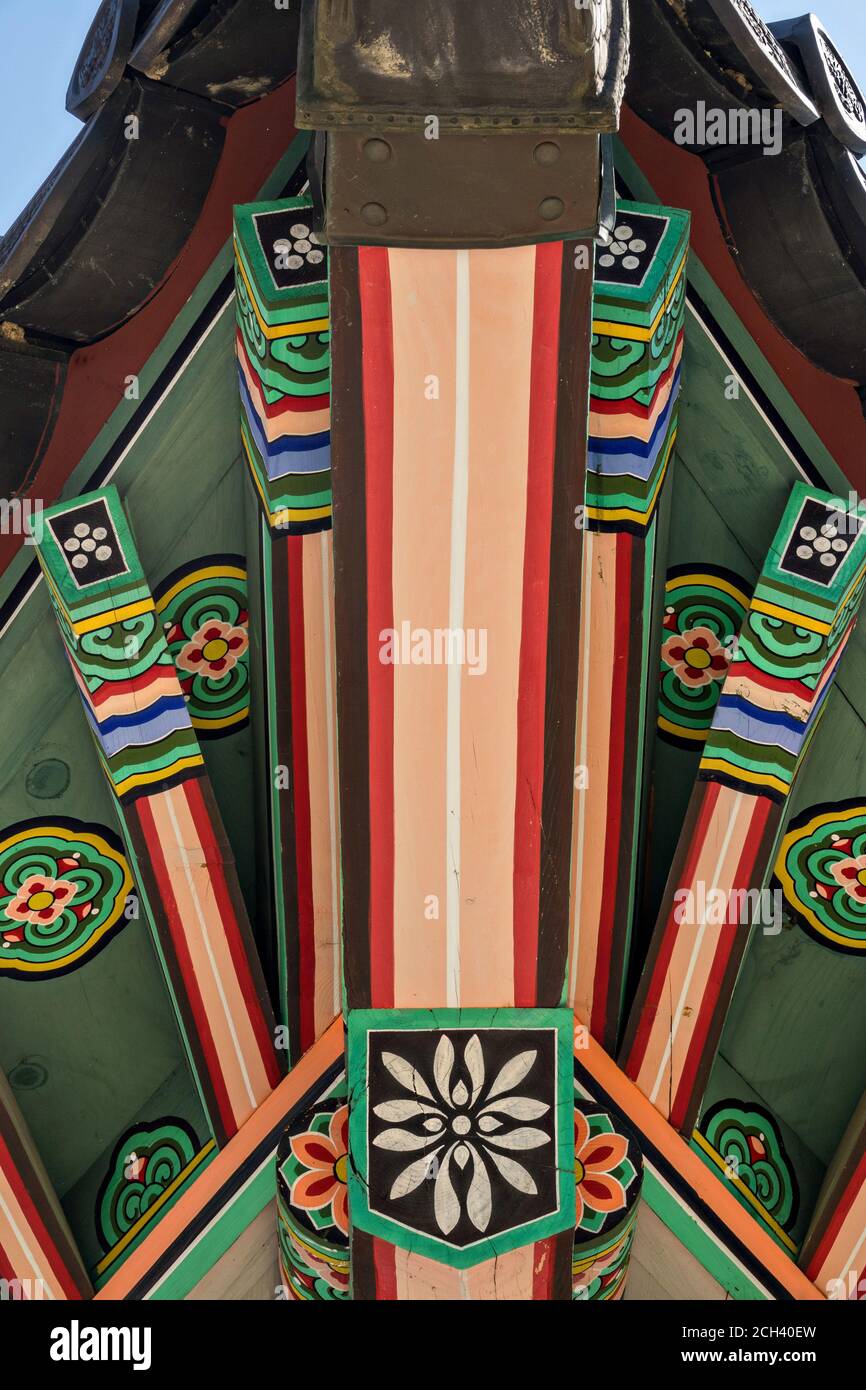 Detail of the vibrant colours of traditionally painted wooden beams and ...