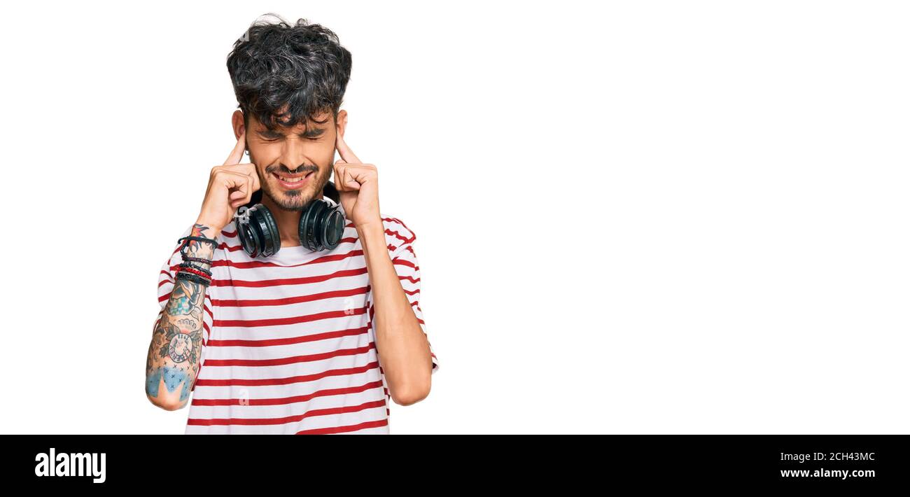 Cover ears loud music Cut Out Stock Images & Pictures - Alamy