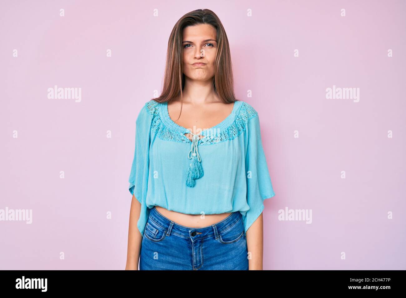 Beautiful caucasian woman wearing casual clothes depressed and worry ...