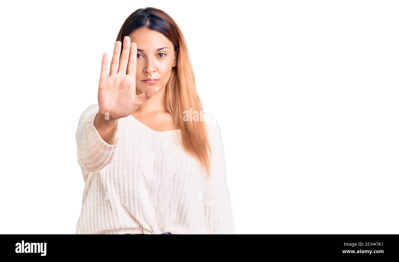 Beautiful young woman wearing casual clothes doing stop sing with palm ...
