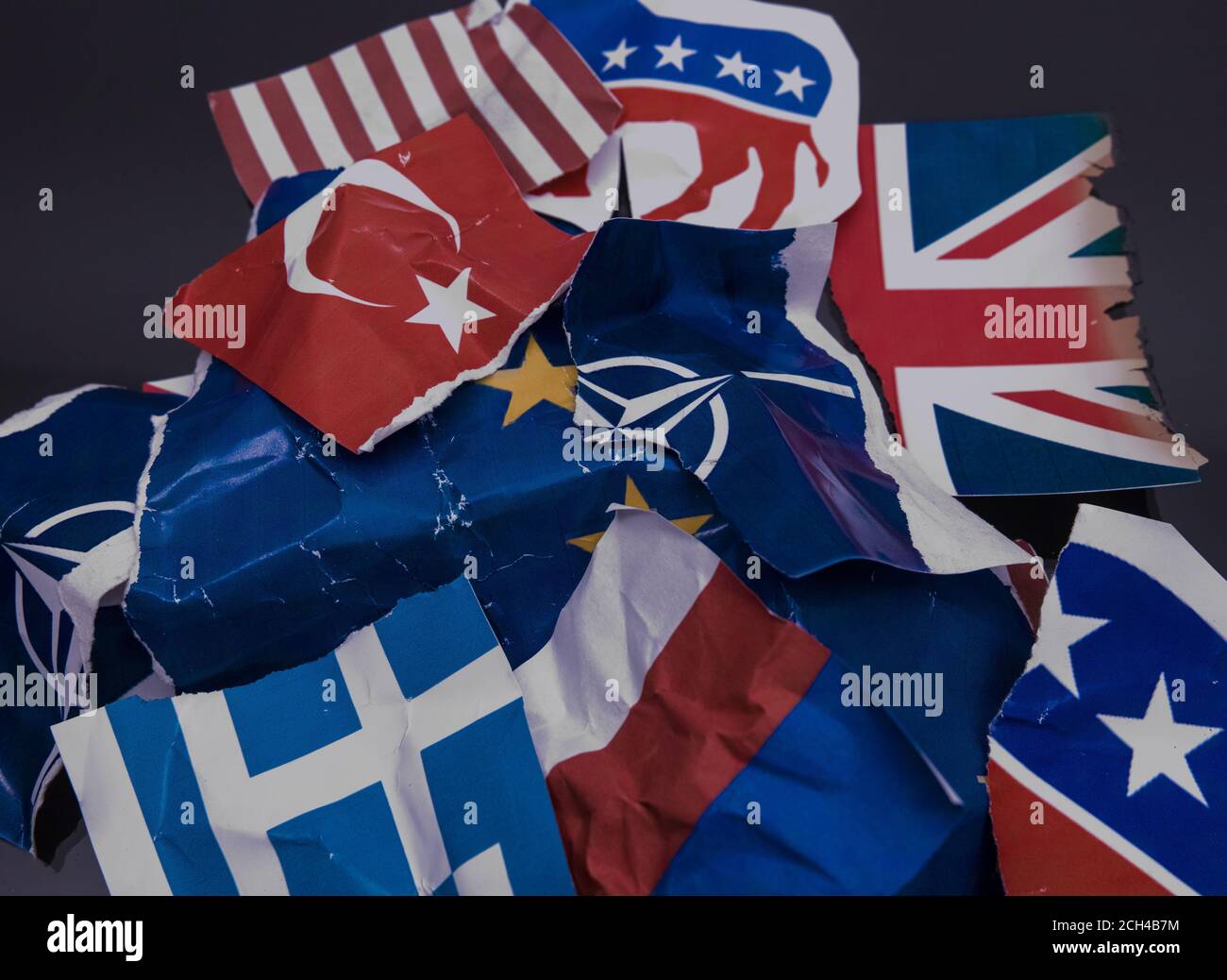 A pile of flags in poor condition or squarely torn, represent the poor ...