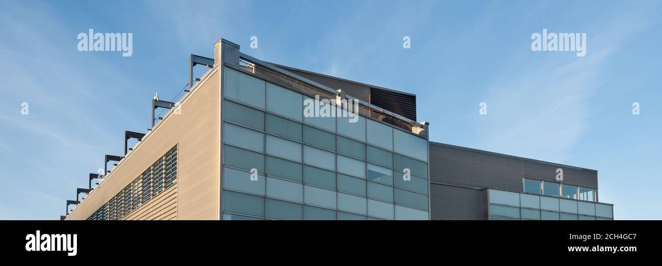 The higher part of the exterior facade of a small generic tower ...