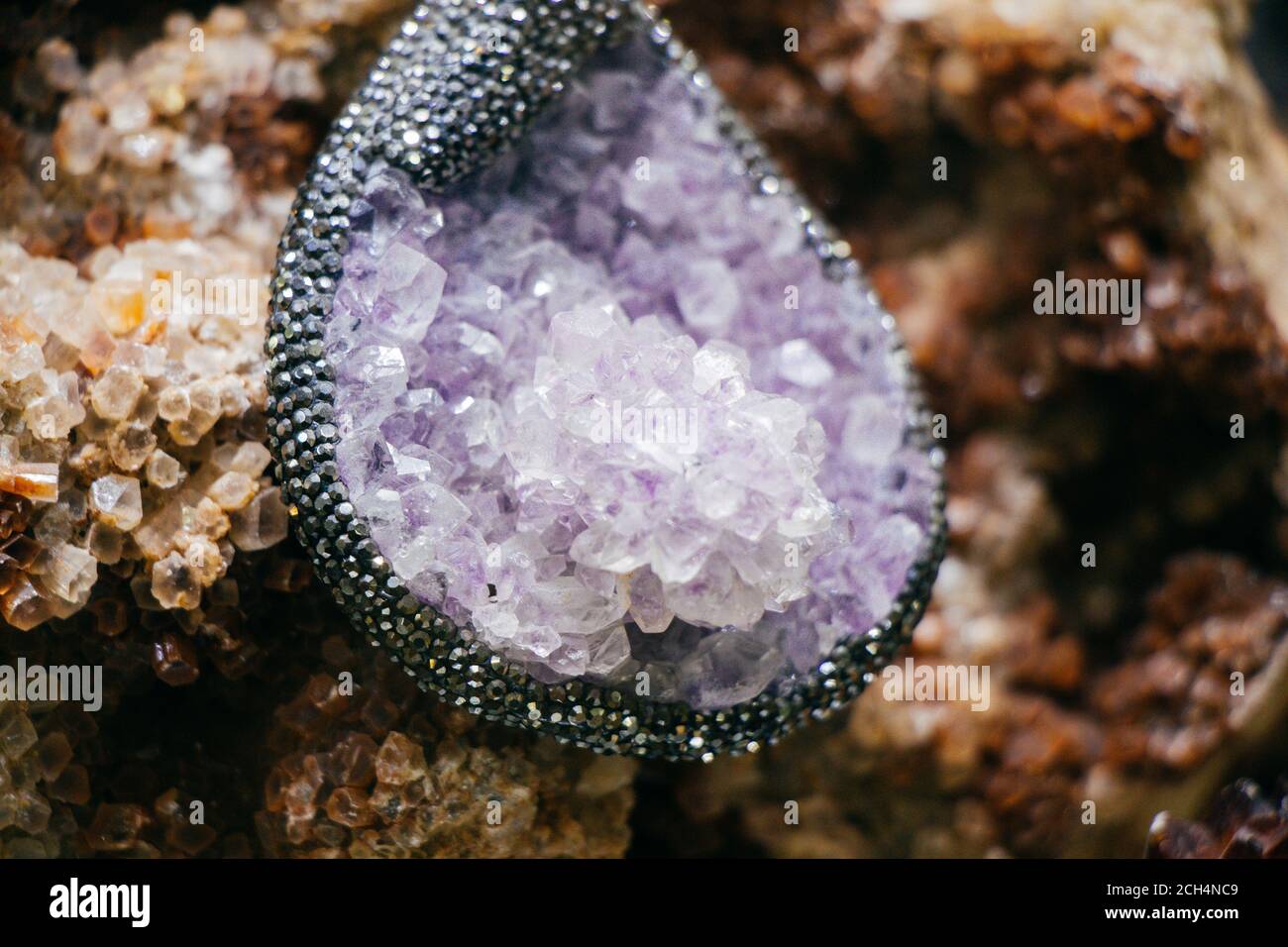 Raw violet amethyst rock with crystal ametist esoteric Stock Photo - Alamy
