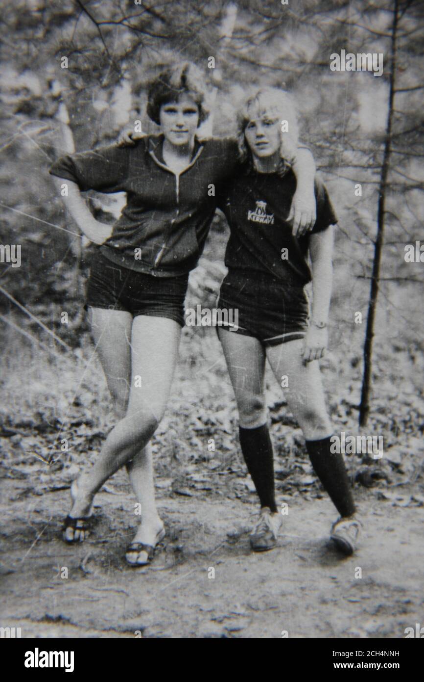 Fine 70s vintage black and white photography of two girl scouts camping ...