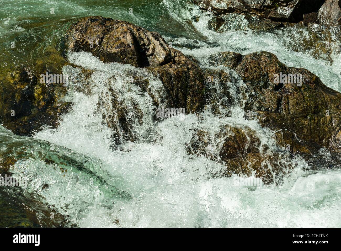Water splashes over rocks hi-res stock photography and images - Alamy