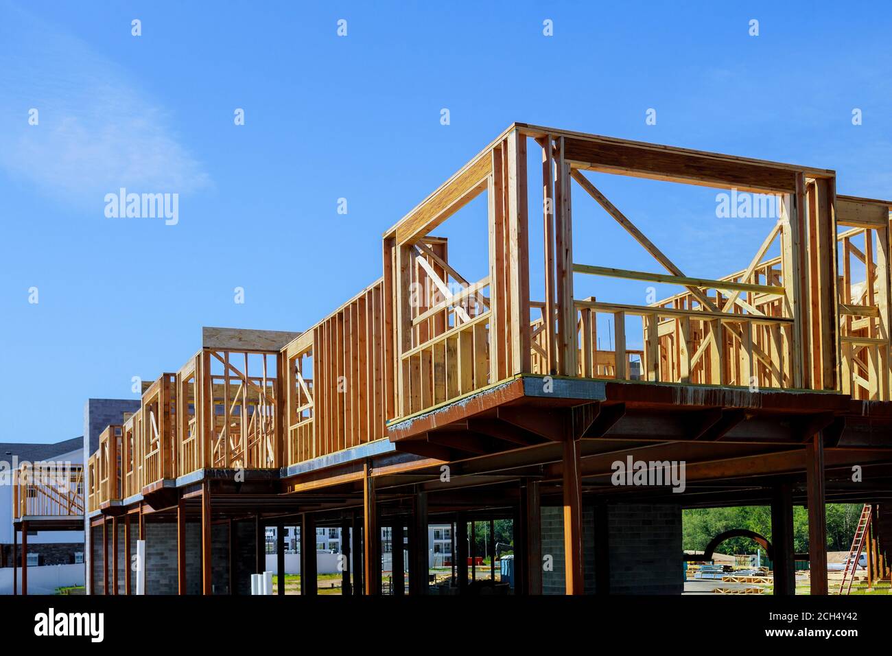 Wooden beam house residential construction home framing Stock Photo - Alamy
