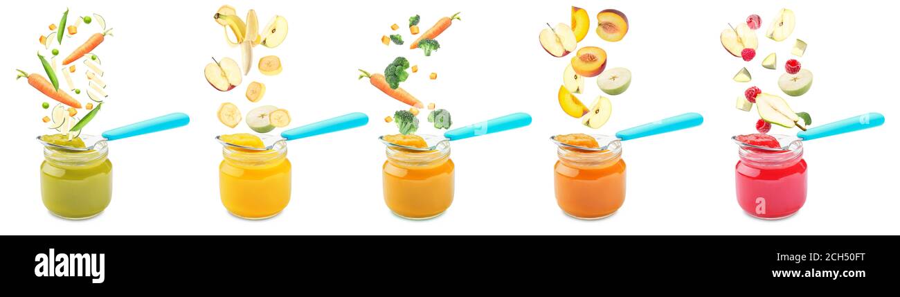 Many jars with healthy baby food and falling ingredients on white ...