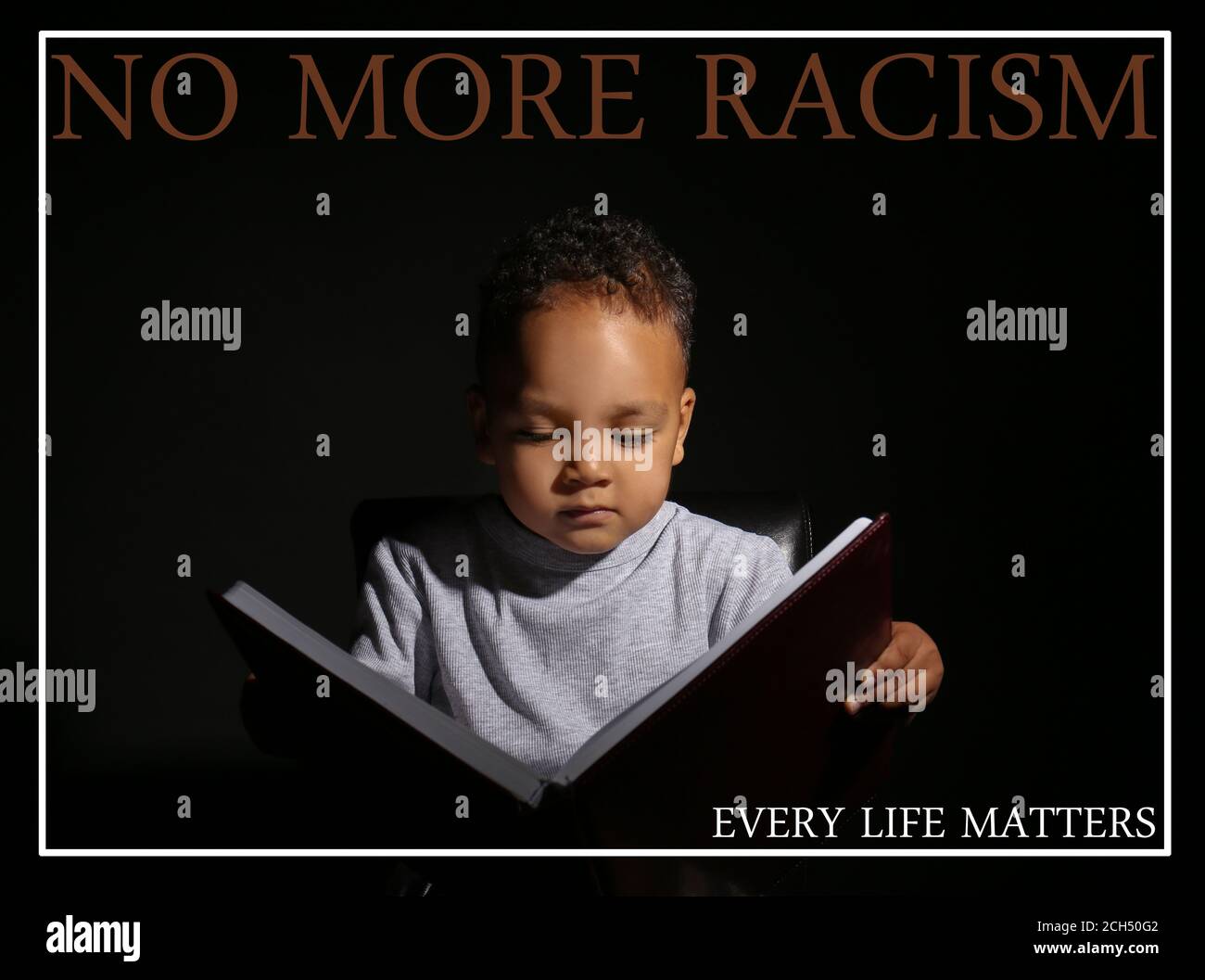 Little African-American boy reading book on dark background with text ...