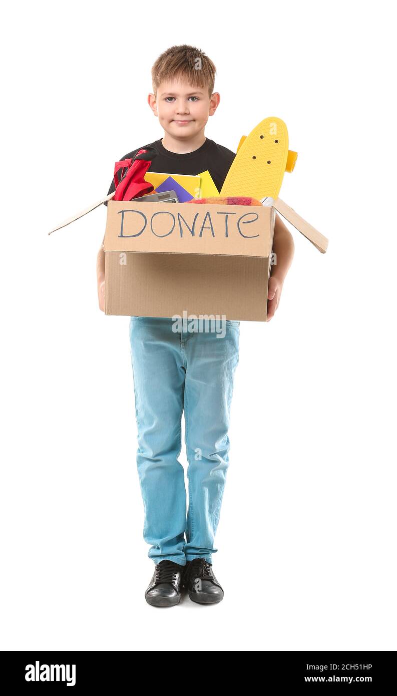 Little boy with donations on white background Stock Photo - Alamy