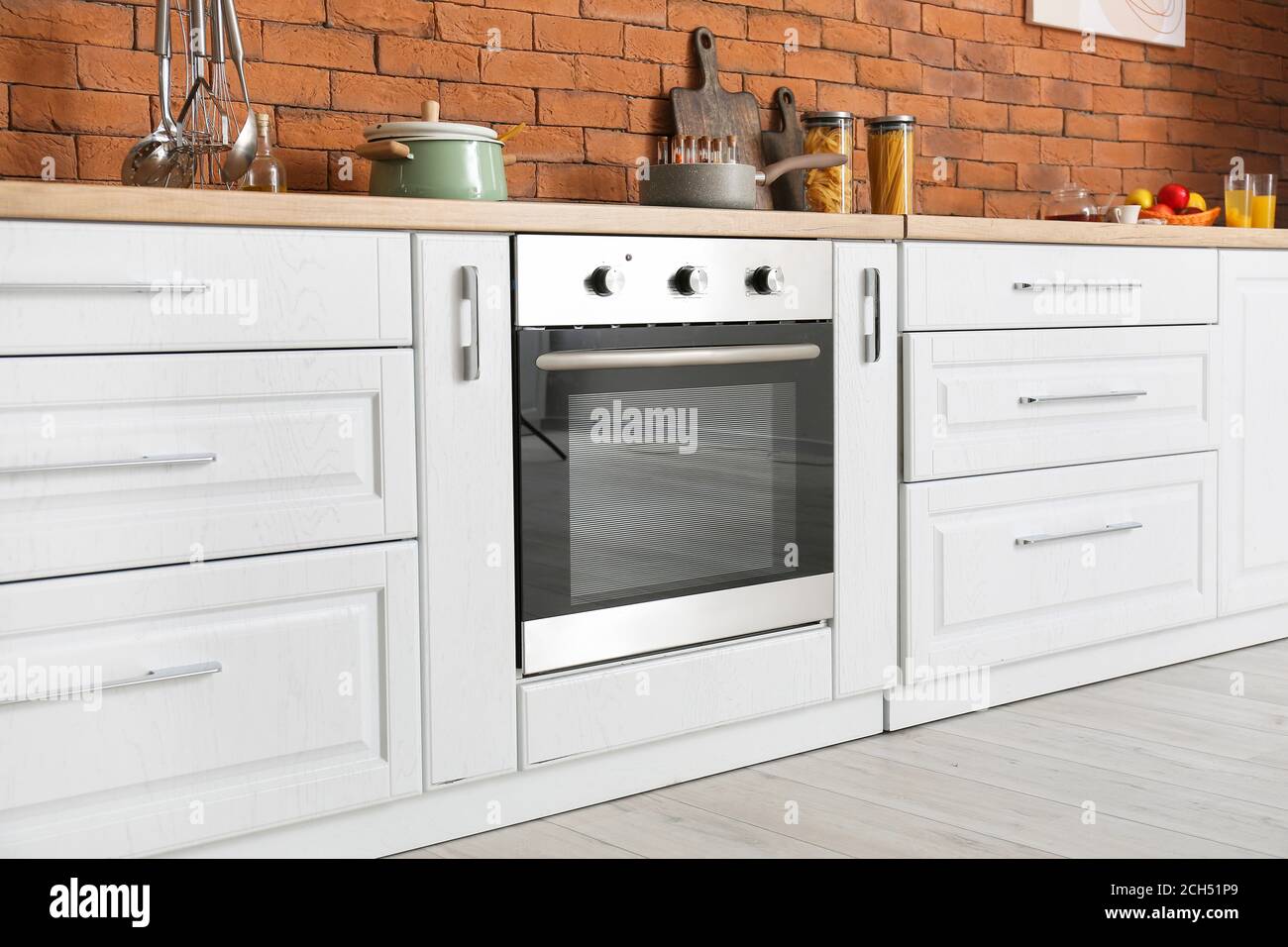 Interior of kitchen with modern oven Stock Photo - Alamy