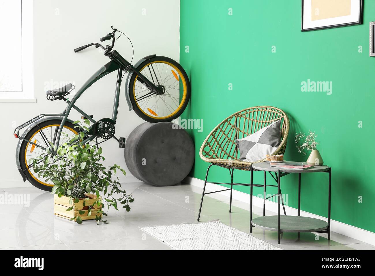 Stylish interior of room with bicycle Stock Photo - Alamy