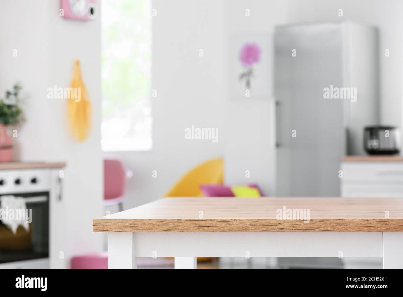 Clean table in interior of modern kitchen Stock Photo - Alamy