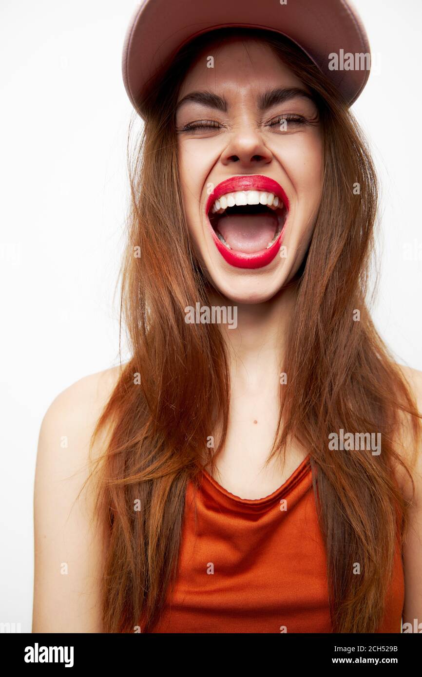 Beautiful woman in a cap Eyes closed model mouth open red lips Stock ...