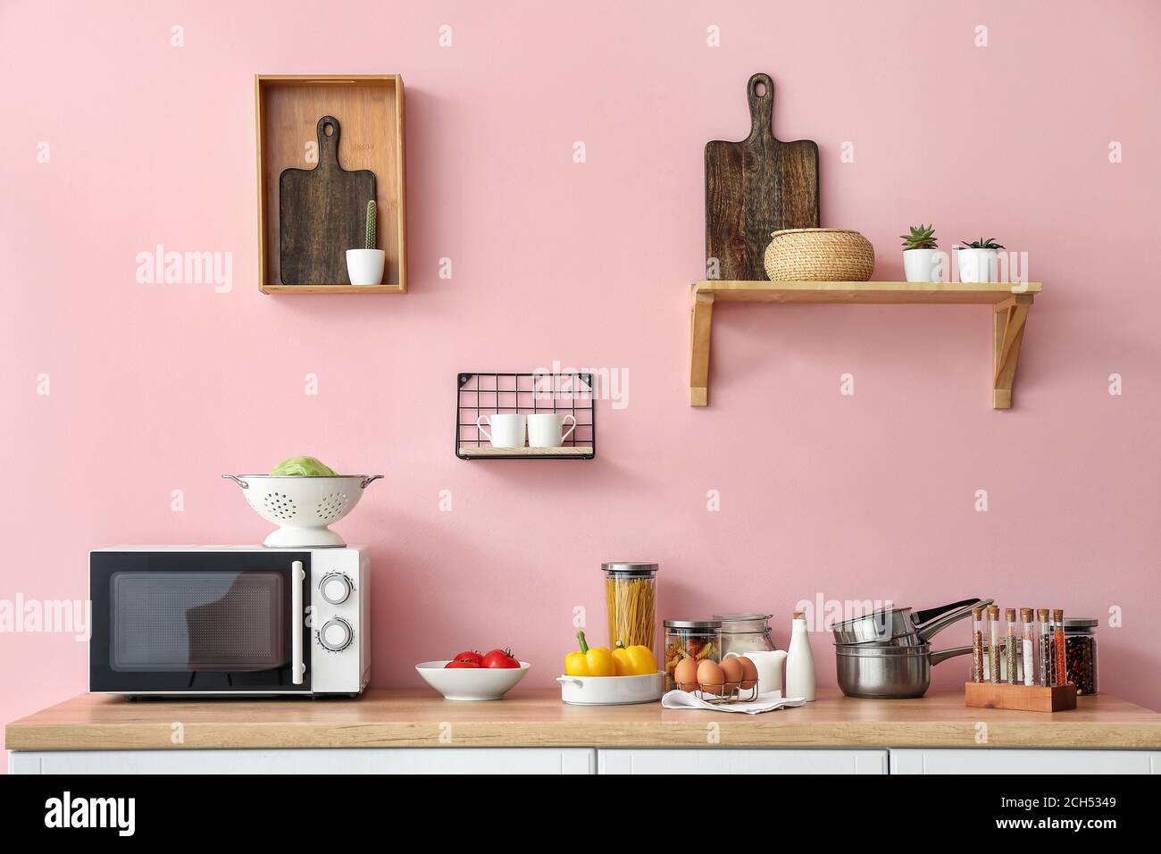 Set of utensils and products on kitchen counter Stock Photo - Alamy