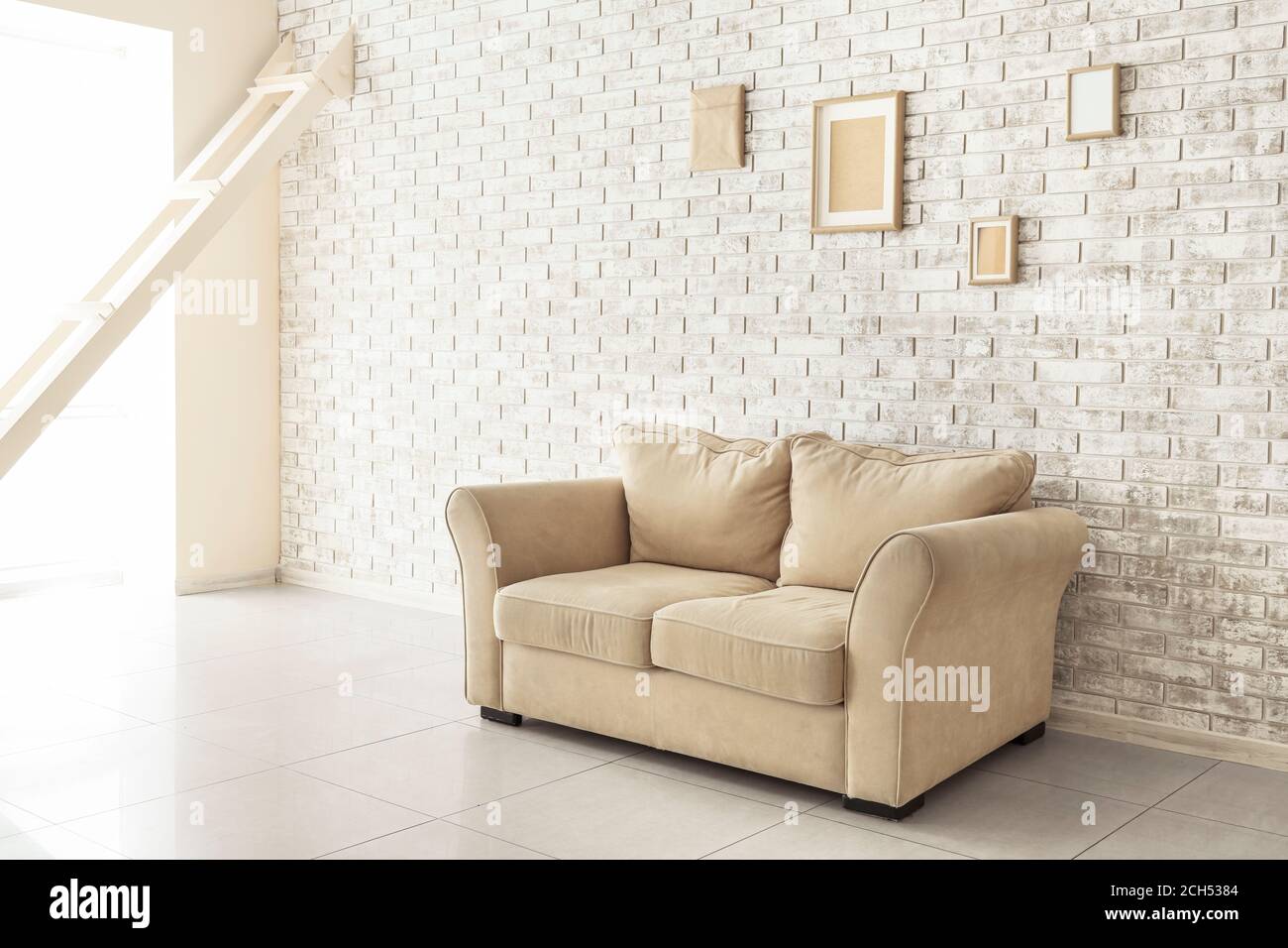 Comfortable sofa in empty hi-res stock photography and images - Alamy