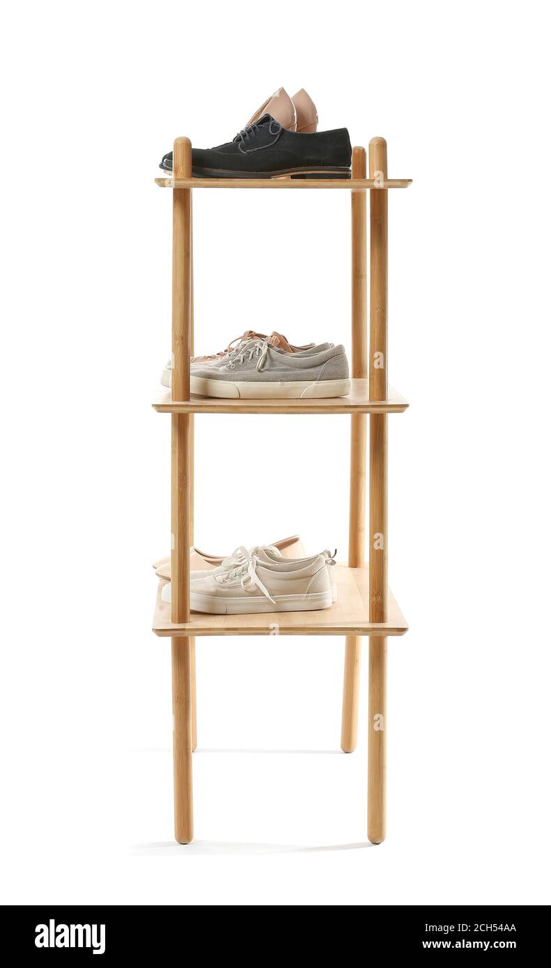 Stand with shoes on white background Stock Photo - Alamy