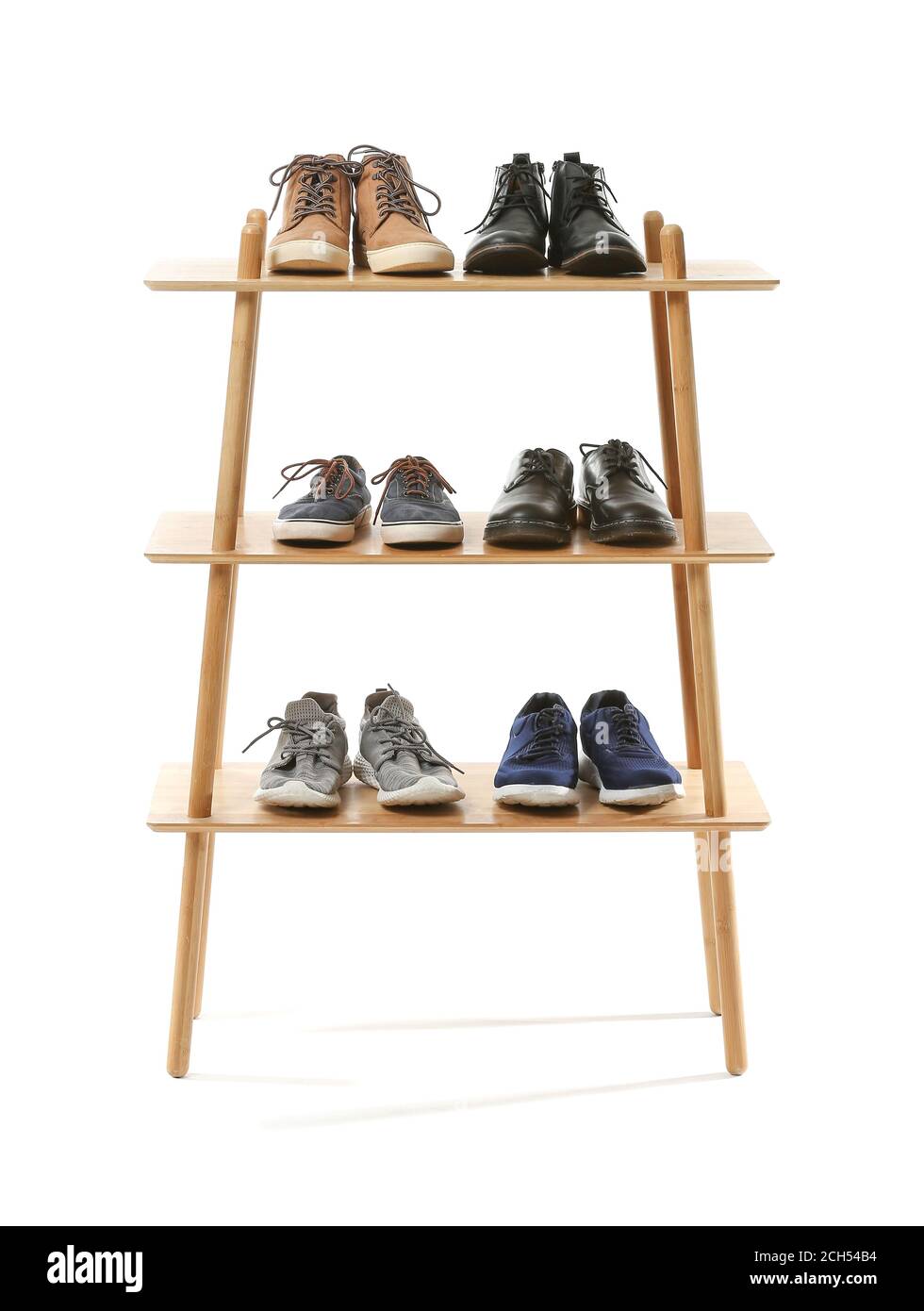 Stand with shoes on white background Stock Photo - Alamy