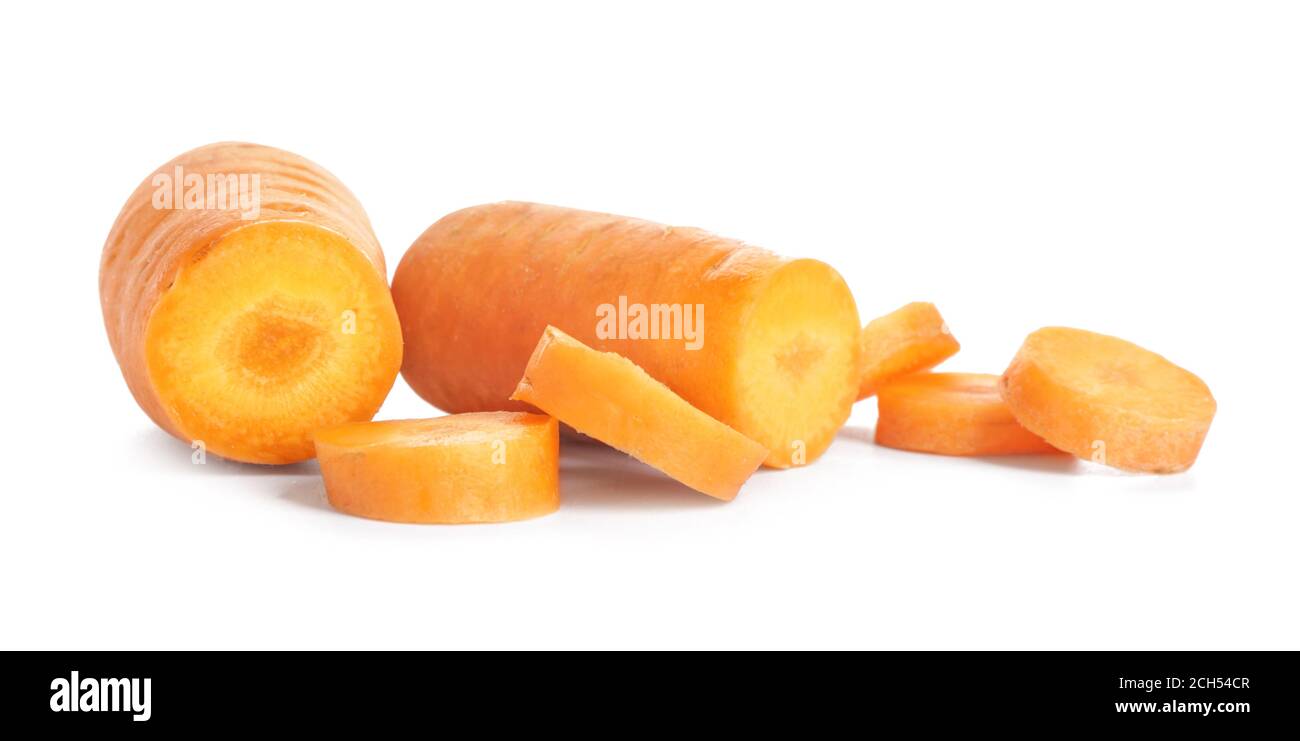 Cut fresh carrots on white background Stock Photo - Alamy