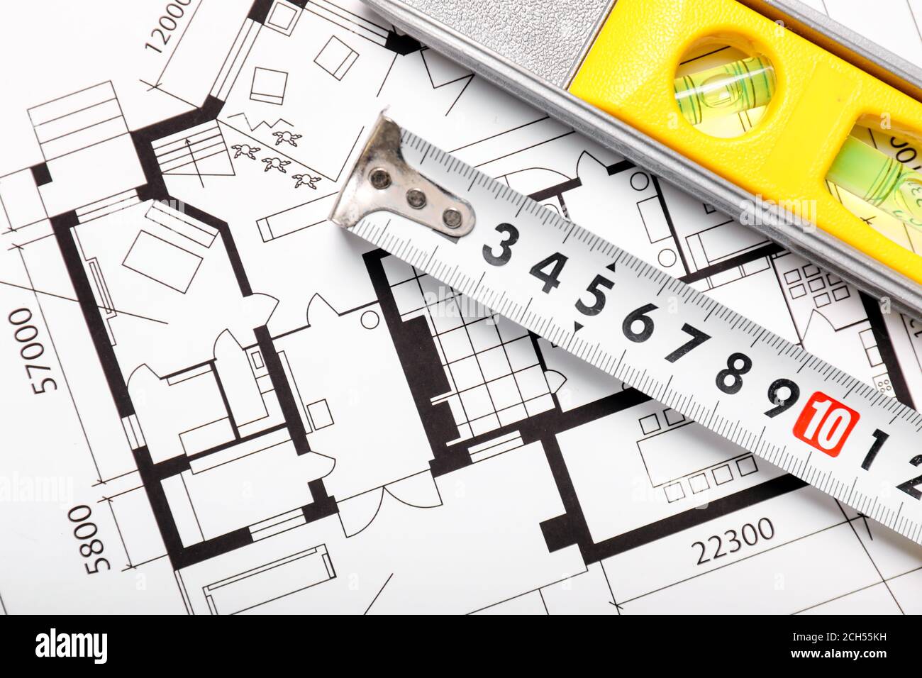 Measuring tape with ruler and blueprint Stock Photo - Alamy