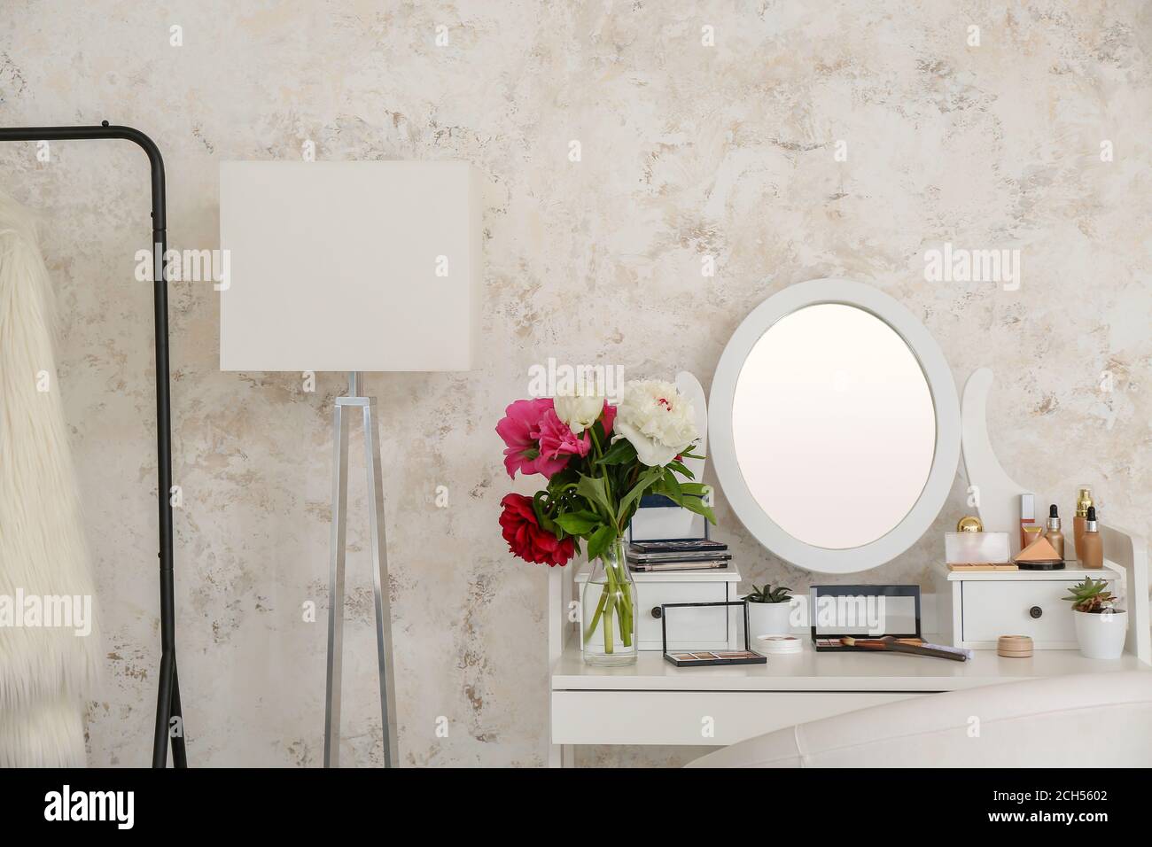 Stylish interior of modern makeup room Stock Photo - Alamy