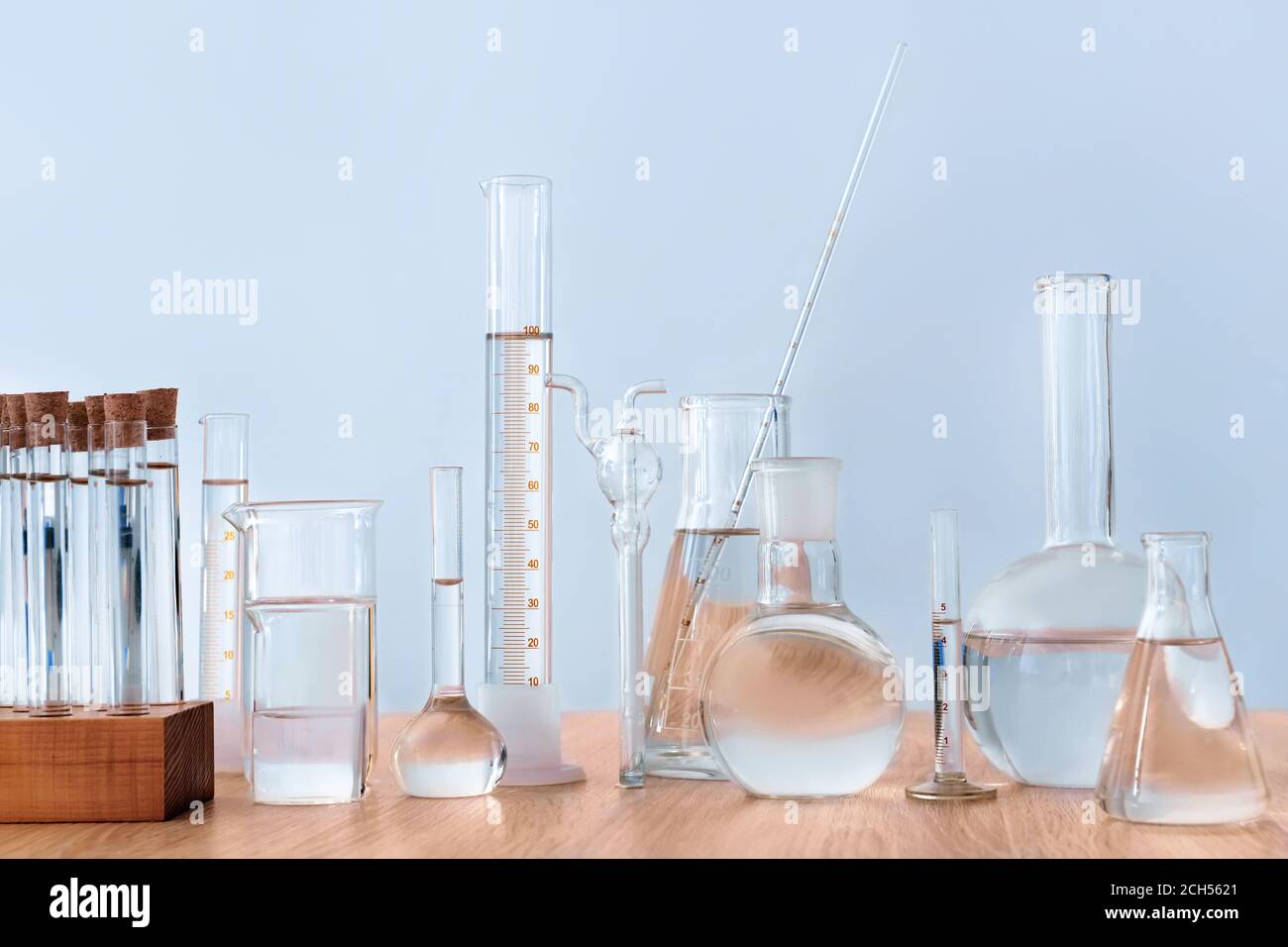 Different glassware on table in laboratory Stock Photo - Alamy